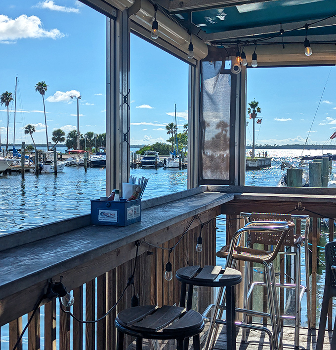 Bar seating with a million-dollar view—where every stool is the best seat in the house and the water practically laps at your feet.