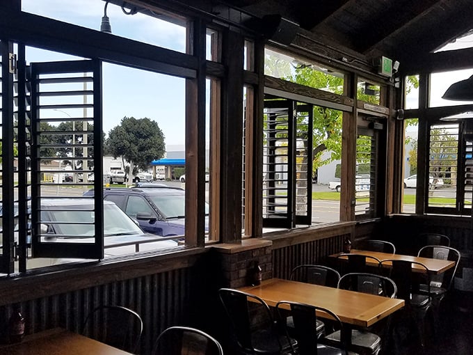 Window seats offer prime people-watching opportunities while you contemplate ordering seconds. The natural light is flattering to both you and your ribs.