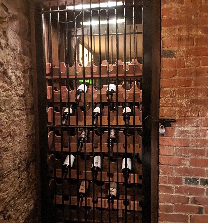 Wine behind bars? The clever nod to the building's history continues with this jail-cell wine storage that's both functional and photogenic.