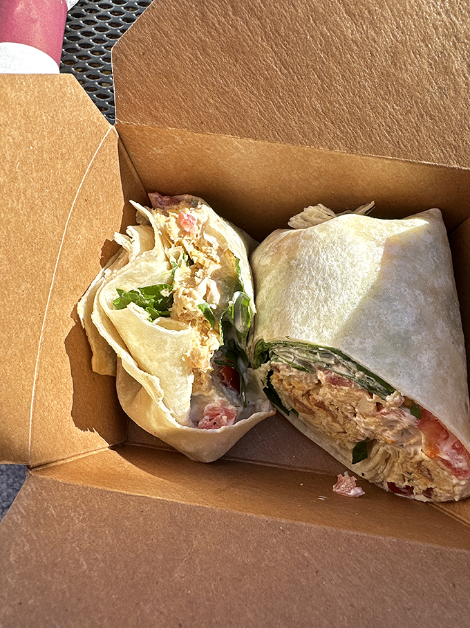 Not all heroes wear capes – some come wrapped in paper. This sandwich wrap looks ready to save your lunch hour from mediocrity with a single, satisfying bite.