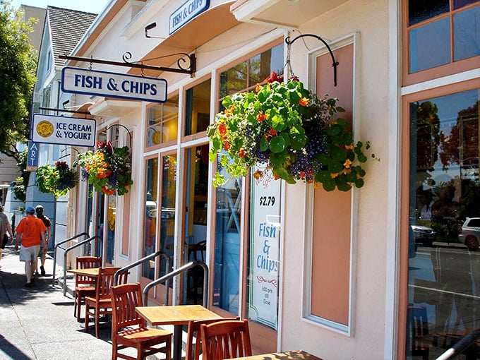 Peach walls and blue trim create a cottage-like charm that makes fish and chips feel like a seaside vacation.