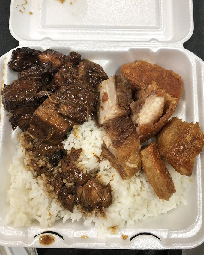 Adobo and lechon kawali sharing a takeout container – like the buddy comedy of Filipino cuisine where both characters steal the show. 