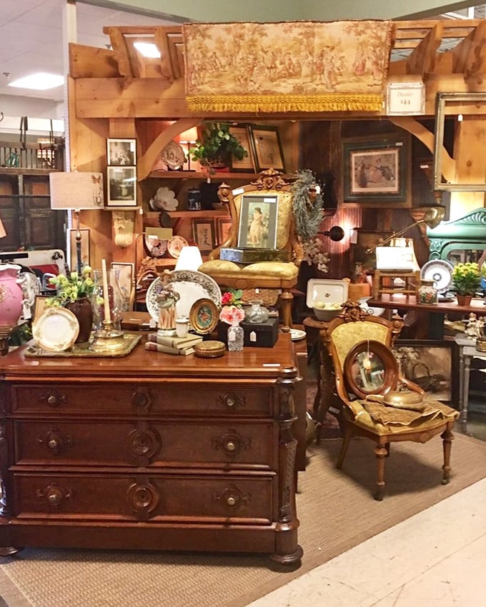 A perfectly staged vignette where every item—from dresser to picture frames—creates a portal to a more ornate, deliberate time.