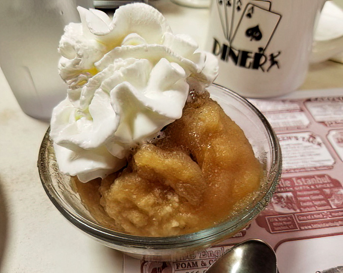 Apple dumplings topped with clouds of whipped cream—proof that fruit can absolutely count as a serving of vegetables. That's how it works, right?