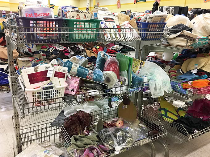 Craft supplies and household odds-and-ends create a beautiful chaos. Martha Stewart would need a week just to organize this treasure trove.