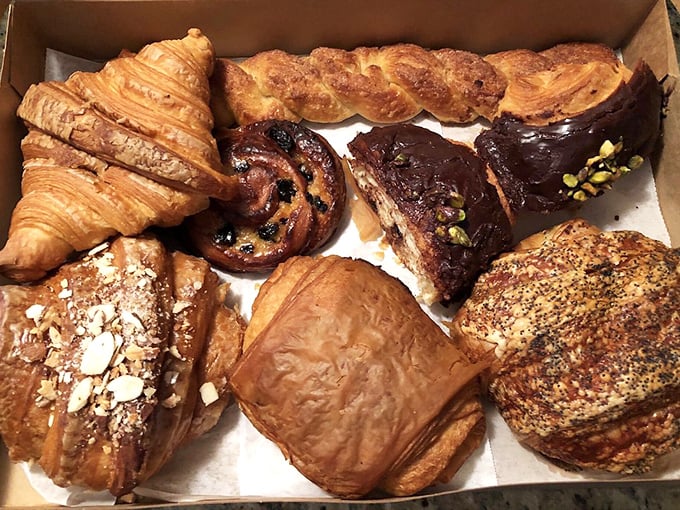 Pastry heaven in a box—where butter and flour have transformed into flaky, golden works of art that whisper, "Diet tomorrow."