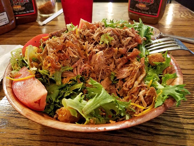 BBQ can be healthy-adjacent! Pulled pork atop fresh greens creates the salad equivalent of wearing a tuxedo T-shirt—formally dressed but ready to party.