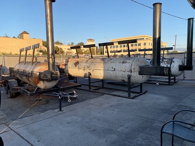 The serious smokers behind the serious barbecue—industrial-sized metal beasts that transform ordinary meat into extraordinary memories.
