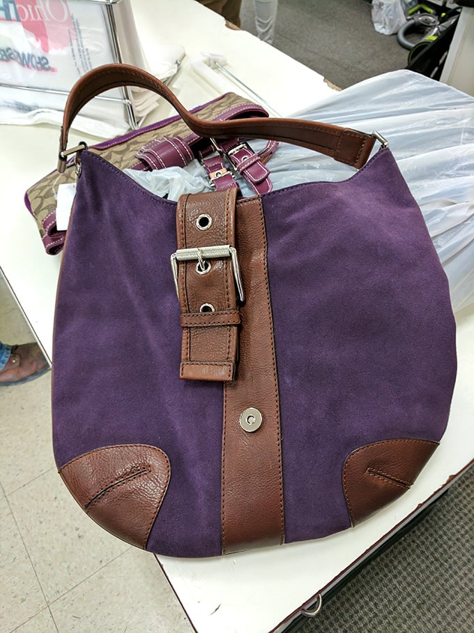 This purple suede handbag probably cost someone three digits. For you? Less than dinner for two at a casual restaurant.