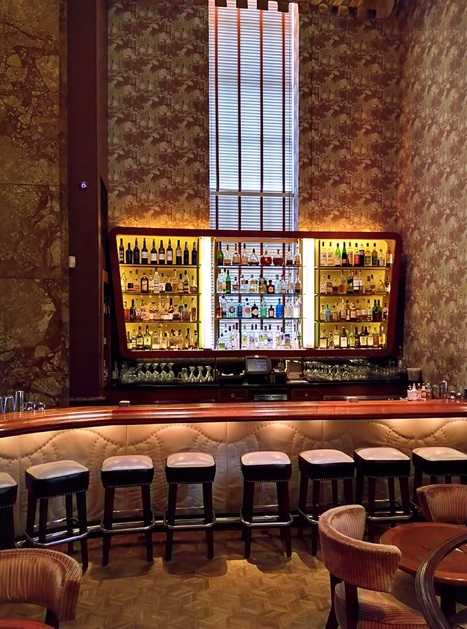 The bar seating invites you to perch and observe the nightly ritual of cocktail crafting—part science, part art, all pleasure.