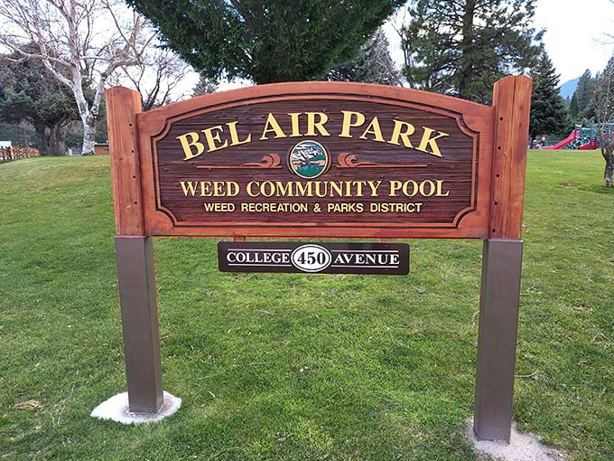 Bel Air Park's welcoming sign promises community swimming and recreation – because mountain towns know how to make a splash.