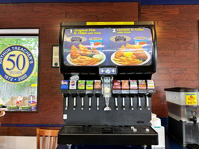 The soda fountain—loyal sidekick to fried delights since forever, offering bubbly relief between bites of battered perfection.