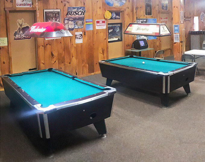 Pool tables waiting for friendly competition—where the real winners are those who ordered another round of appetizers for the table.