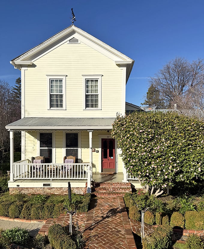 This picture-perfect Victorian with its herringbone brick path and meticulous landscaping isn't a museum—it's the Brinnwood, where you can actually stay overnight.