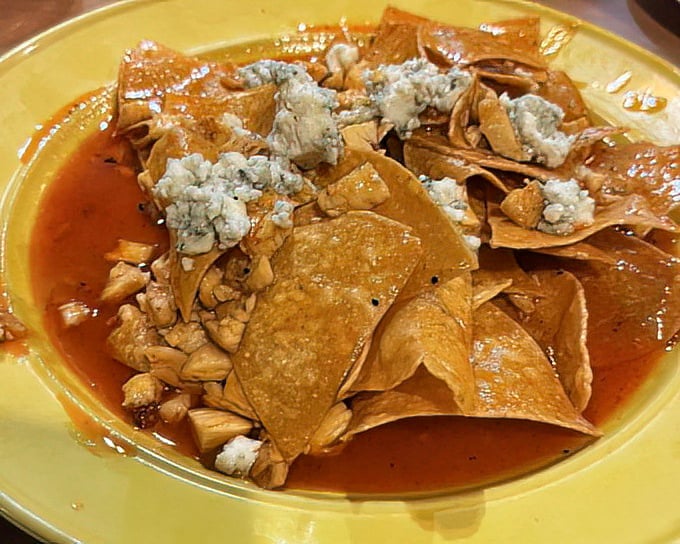 Buffalo nachos that redefine the concept of "sharing food." That blue cheese crumble creates little pockets of tangy surprise amid the spicy sauce.