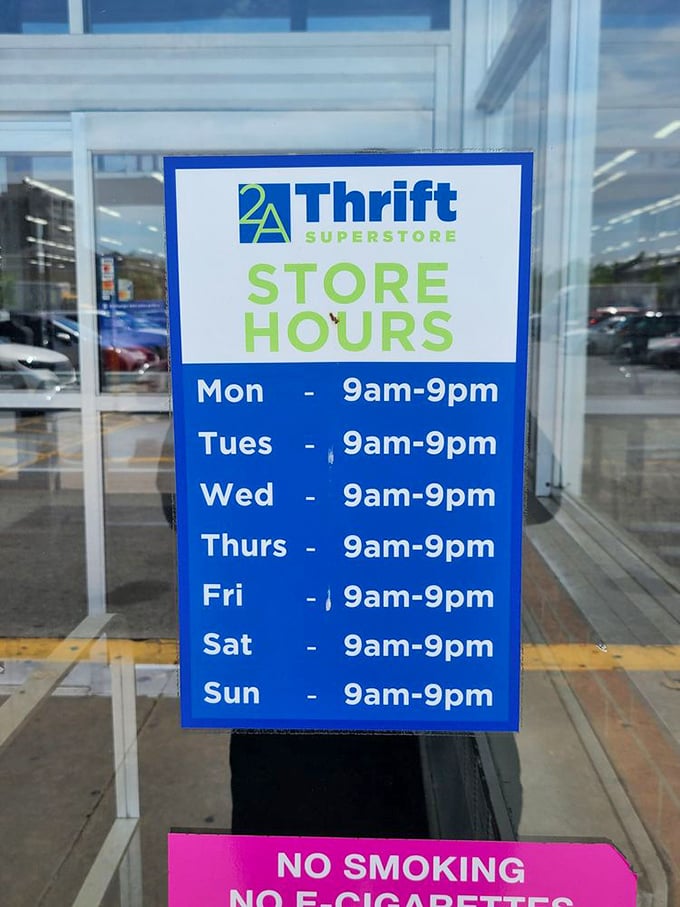 The hours sign – a beacon of hope for night owls and early birds alike. Thrifting waits for no one!