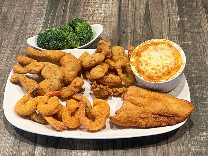 This seafood platter is the ocean's greatest hits album – fried shrimp, scallops, and fish with sides that know their supporting role perfectly.