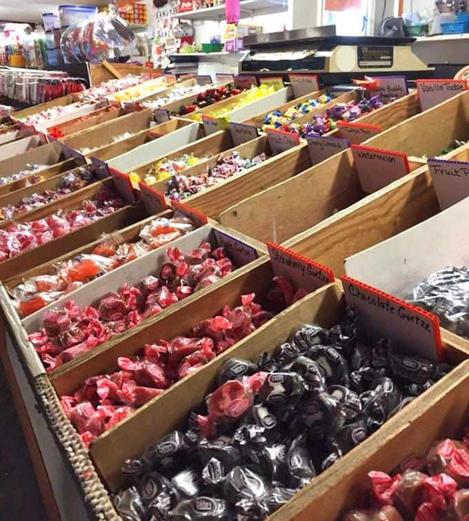 Candy organized with military precision. Each wooden compartment holds sweet memories—and future cavities—sorted by color and childhood nostalgia.