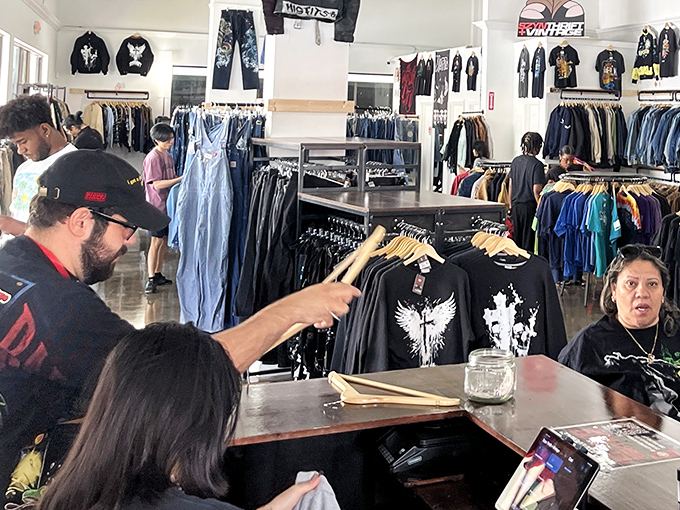 Where transactions happen and thrifting stories are exchanged – the checkout area doubles as command central for fashion resurrection.