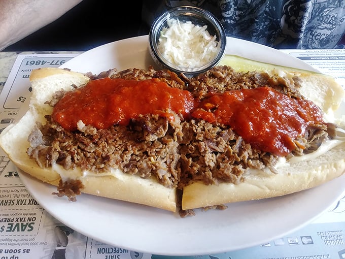 The cheesesteak that launched a thousand napkins—a glorious mess of meat, cheese, and sauce that demands your full attention and zero dignity.