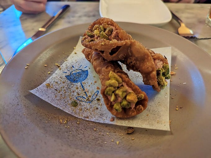 Cannoli reimagined – crispy shells filled with savory surprise instead of sweet, proving Italian traditions can still surprise us.
