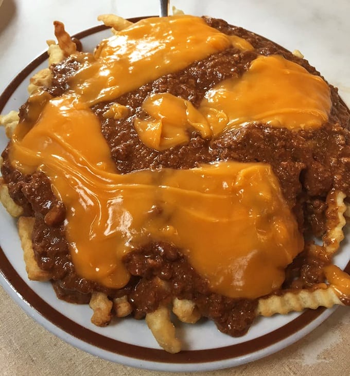 Chili cheese fries that don't pretend to be anything but what they are: a glorious, gooey celebration of America's finest contributions to comfort cuisine.