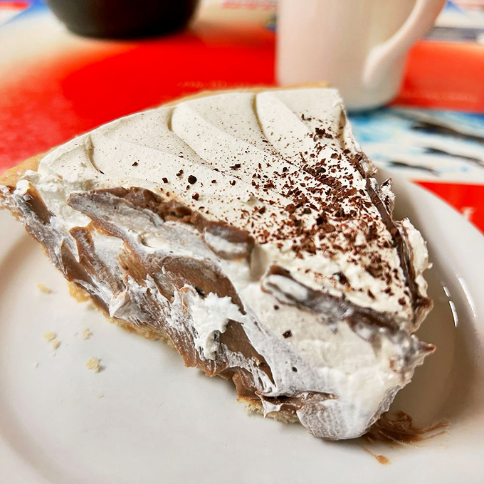 This chocolate cream pie doesn't just satisfy a sweet tooth—it throws a party for it, with layers of chocolate and cream playing host.