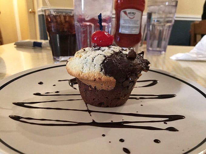 This chocolate muffin with its cherry hat isn't just dessert disguised as breakfast—it's a legitimate reason to get out of bed.