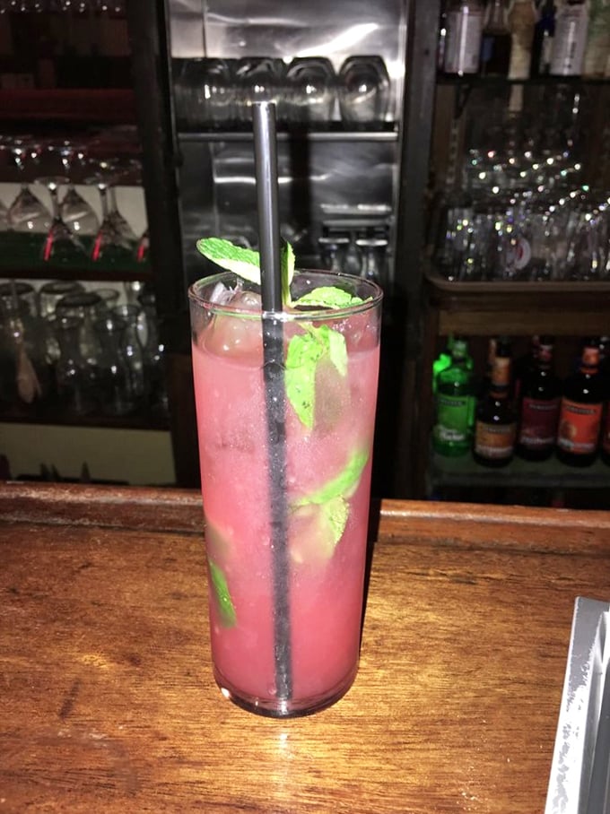 This isn't just a pink drink – it's summer in a glass, with mint leaves standing guard over refreshment that demands a second round.