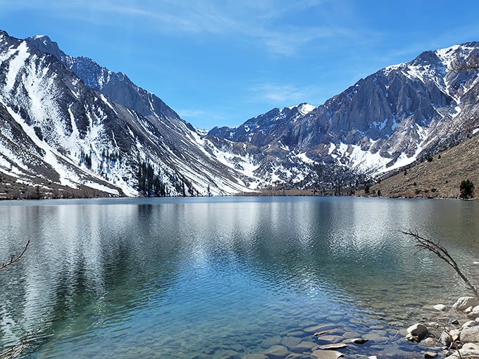 Convict Lake's mirror-perfect reflection doubles the mountain drama – twice the view for the same easy hike.