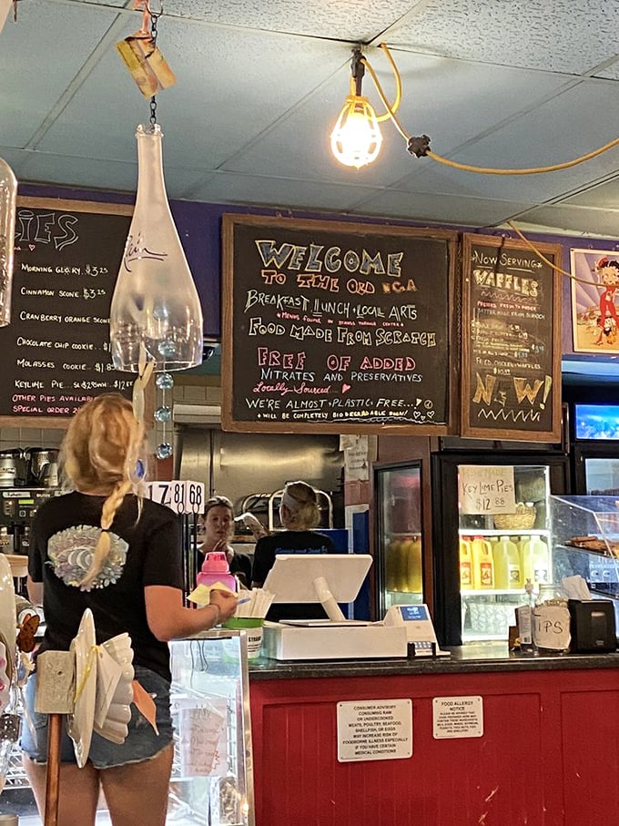The ordering counter where breakfast dreams come true. Their chalkboard menu promises food "made from scratch"—four words that justify any wait.