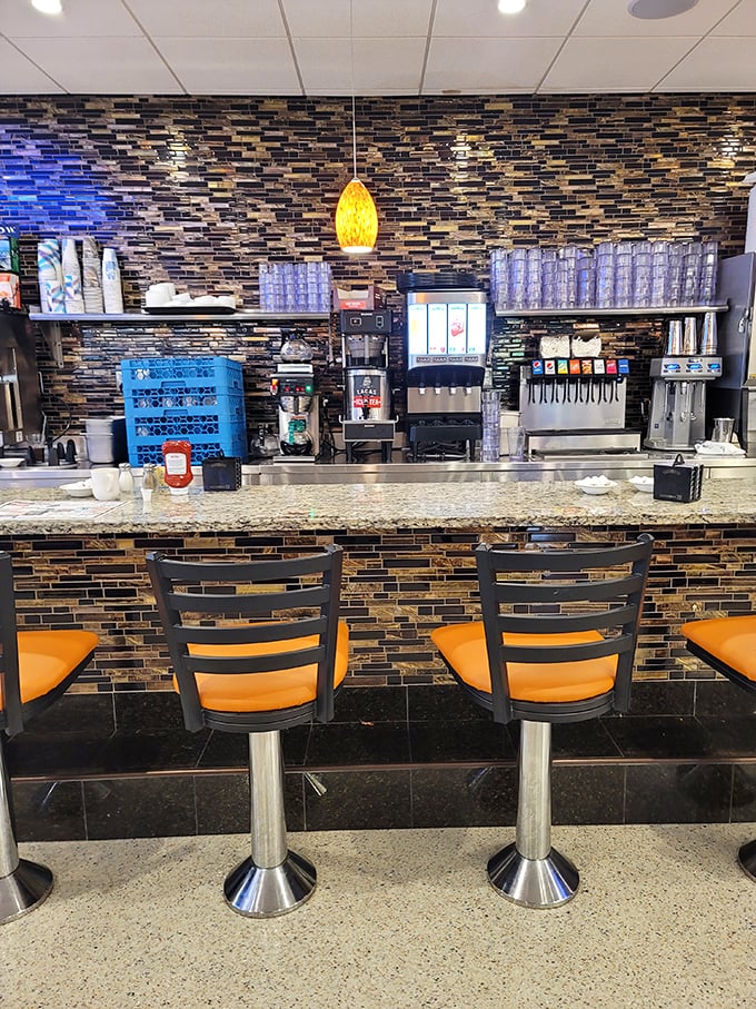 Counter seats: front-row tickets to the greatest show on earth—short-order cooks performing culinary magic while you sip your coffee.