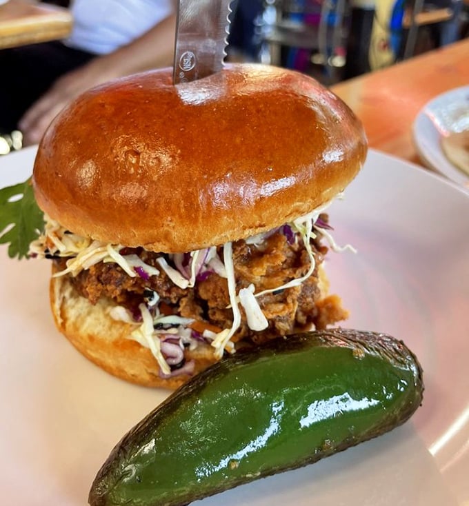 This isn't just a chicken sandwich – it's architecture. Layers of crispy goodness demanding respect and a two-handed commitment.
