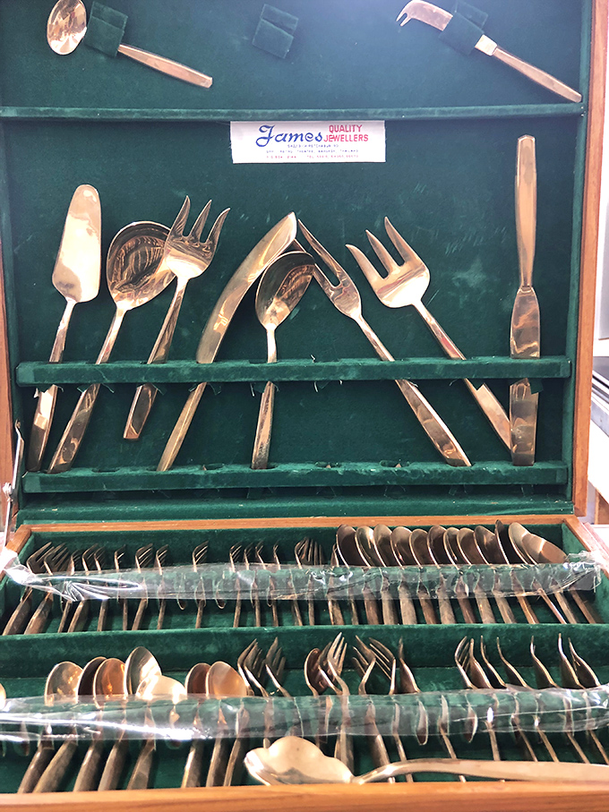 That silverware set from "James Quality Jewelers" has served countless Sunday dinners and is ready to grace your table with vintage elegance.