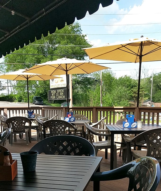 Umbrella-shaded deck tables offer the perfect vantage point for watching the world roll by – literally, on two wheels most of the time.