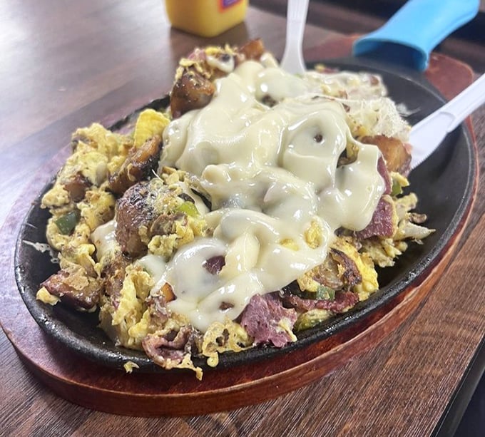 This skillet creation isn't just breakfast – it's a declaration that mornings deserve more than just cereal and regret.