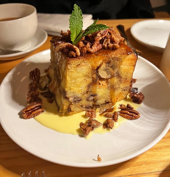 Not just dessert—it's architectural brilliance. This bread pudding with candied pecans could make a grown New Yorker weep with joy.