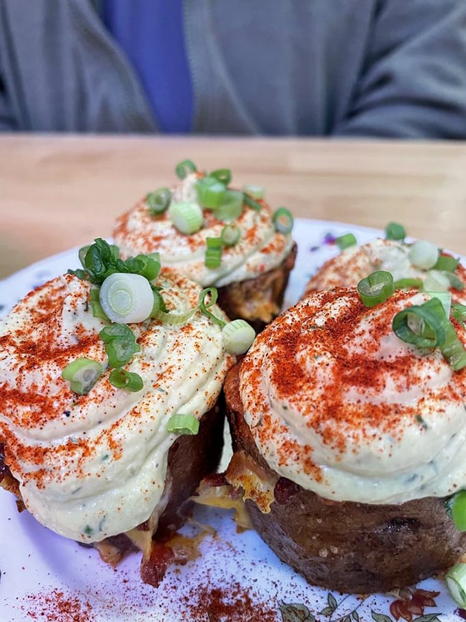 Deviled potatoes that would make angels question their allegiance. Creamy, spicy, and topped with scallions—a devilishly good twist on a classic.