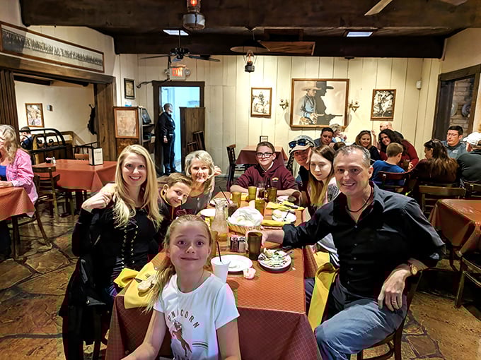Multi-generational dining at its finest—where family stories are shared over plates that could make a vegetarian reconsider their life choices. Memory-making in progress.