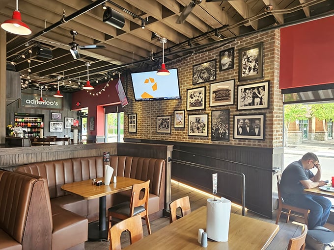 The dining area wall gallery – a visual history lesson of Columbus sports moments that pairs perfectly with every slice.