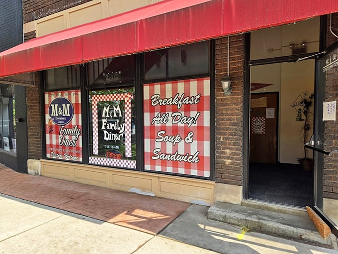 The inviting entrance proudly announces "Breakfast All Day!"—three words that rank among the most beautiful in the English language.
