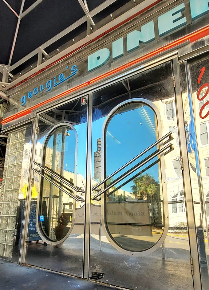 Those iconic curved glass doors with "georgie's DINER" emblazoned above—the portal to comfort food paradise. Step through and leave your diet at the door.