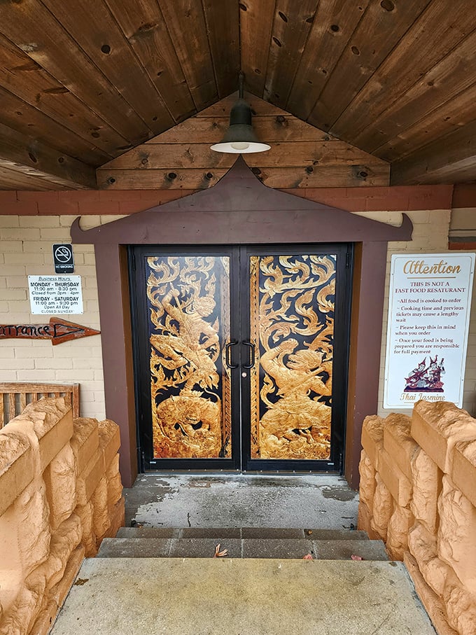 These ornate golden doors aren't just an entrance—they're a portal transporting you from small-town Ohio to the vibrant streets of Bangkok.