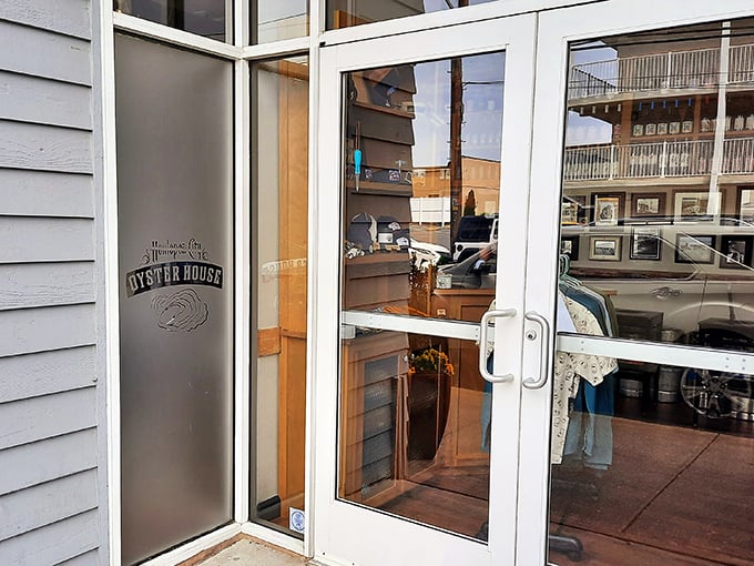 The entrance promises seafood nirvana behind its unassuming glass doors—the best culinary journeys often begin this way.