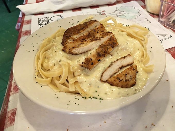 Fettuccine Alfredo with perfectly grilled chicken—a dish so simple yet so satisfying that it makes you question why anyone would complicate Italian food.