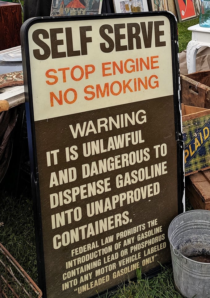 Gas station warnings from simpler times. Vintage signage that reminds us when self-serve pumps were revolutionary enough to require detailed instructions.