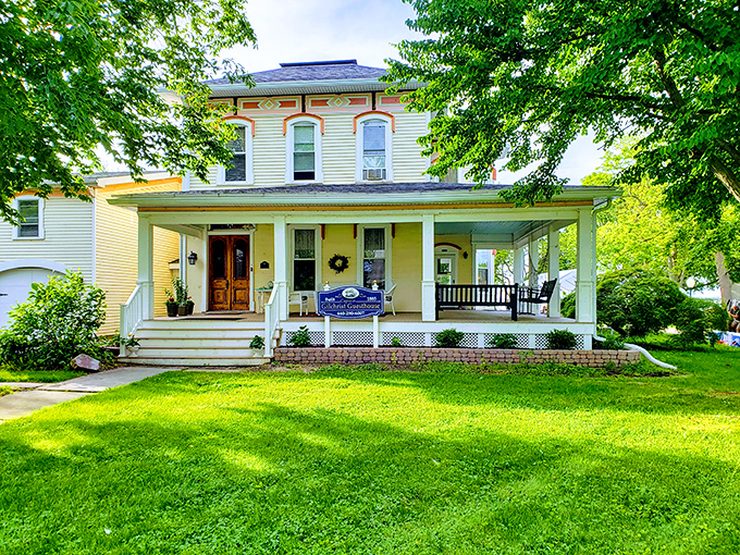 This classic porch-wrapped home isn't just architecture—it's an invitation to sit a spell and watch the world not rush by.