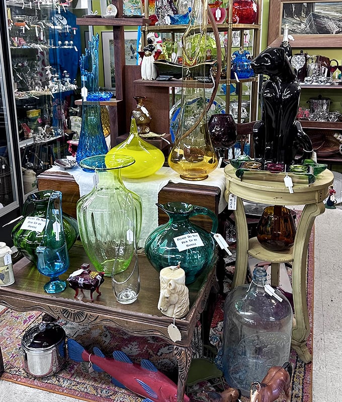 Colorful glass catches the light like liquid jewels. Each vase has outlived countless flower arrangements and design trends.