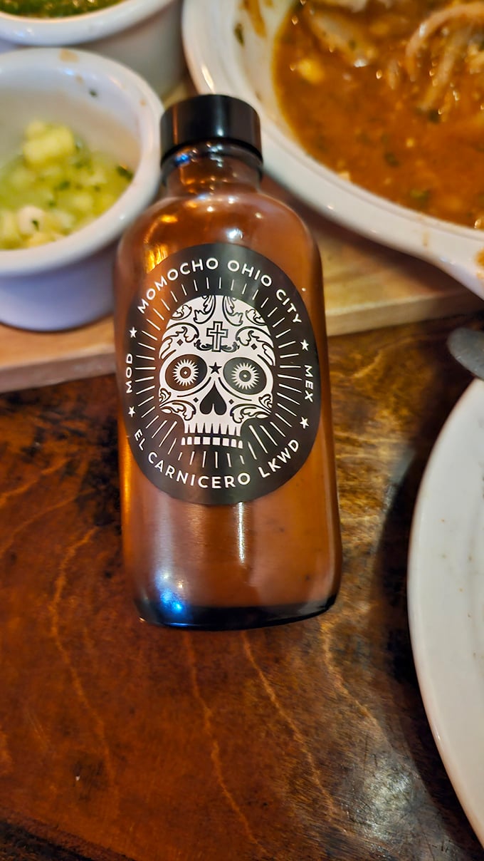 Their signature hot sauce bottle sports a Day of the Dead skull—a warning and an invitation all at once to brave souls seeking flavor adventure.