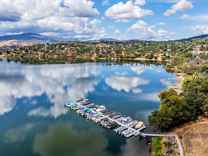 The lake mirrors clouds with such precision you'd think they were practicing for a synchronized swimming competition.